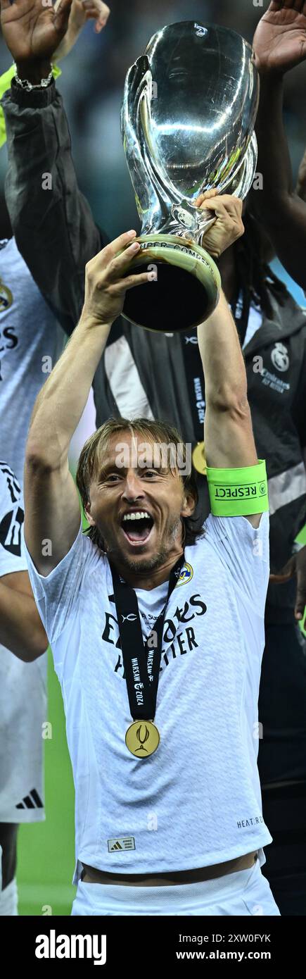 WARSAW, POLAND - AUGUST 14: Luka Modric of Real Madrid with a trophy ...