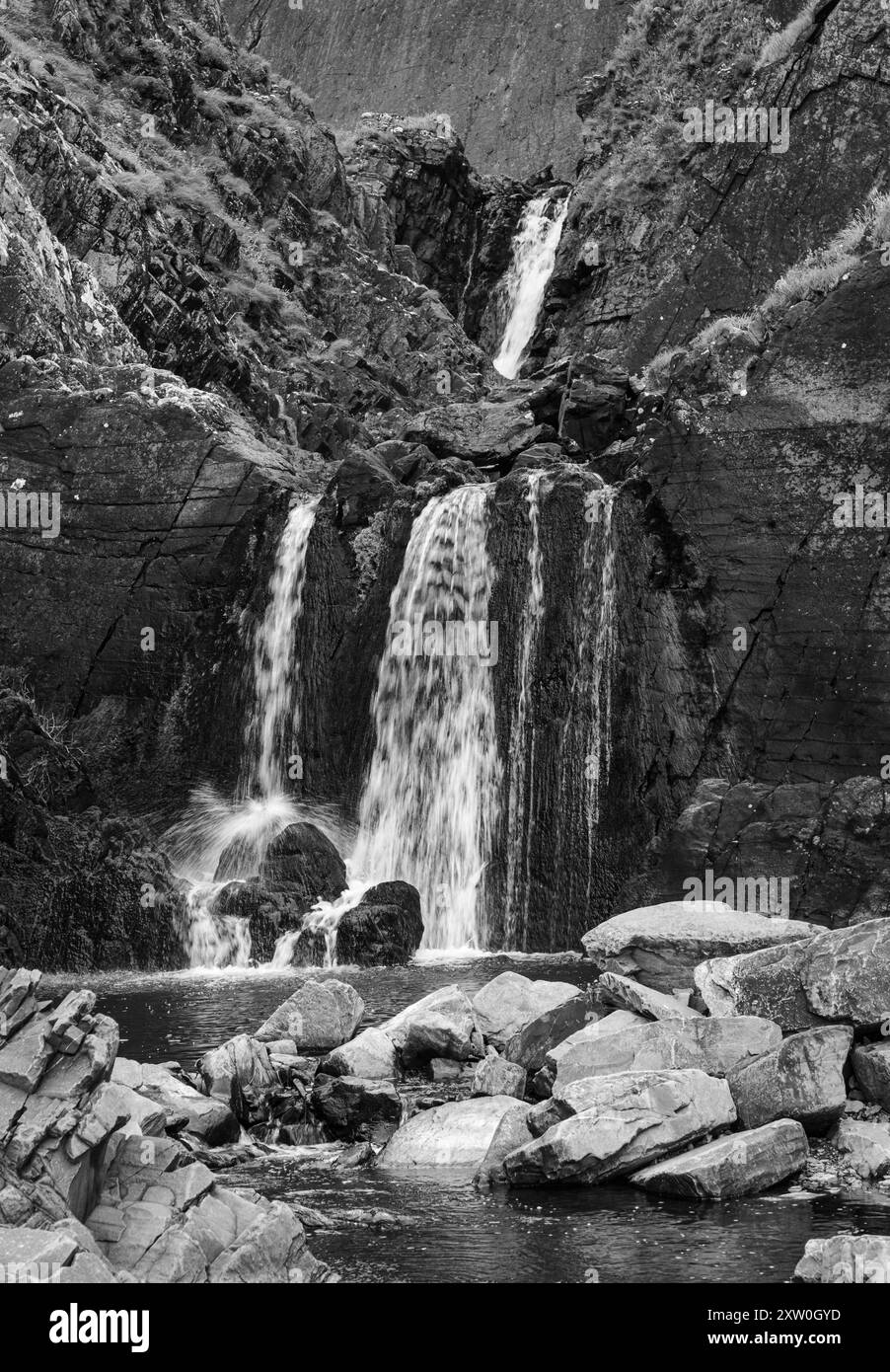 Waterfall cascading on rocks Black and White Stock Photos & Images - Alamy