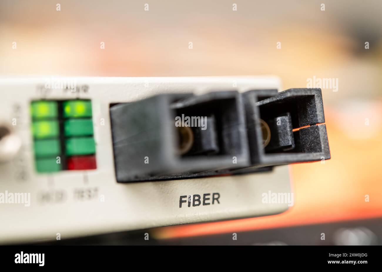 Detailed view of fiber optic ports with green and red signal indicators ...