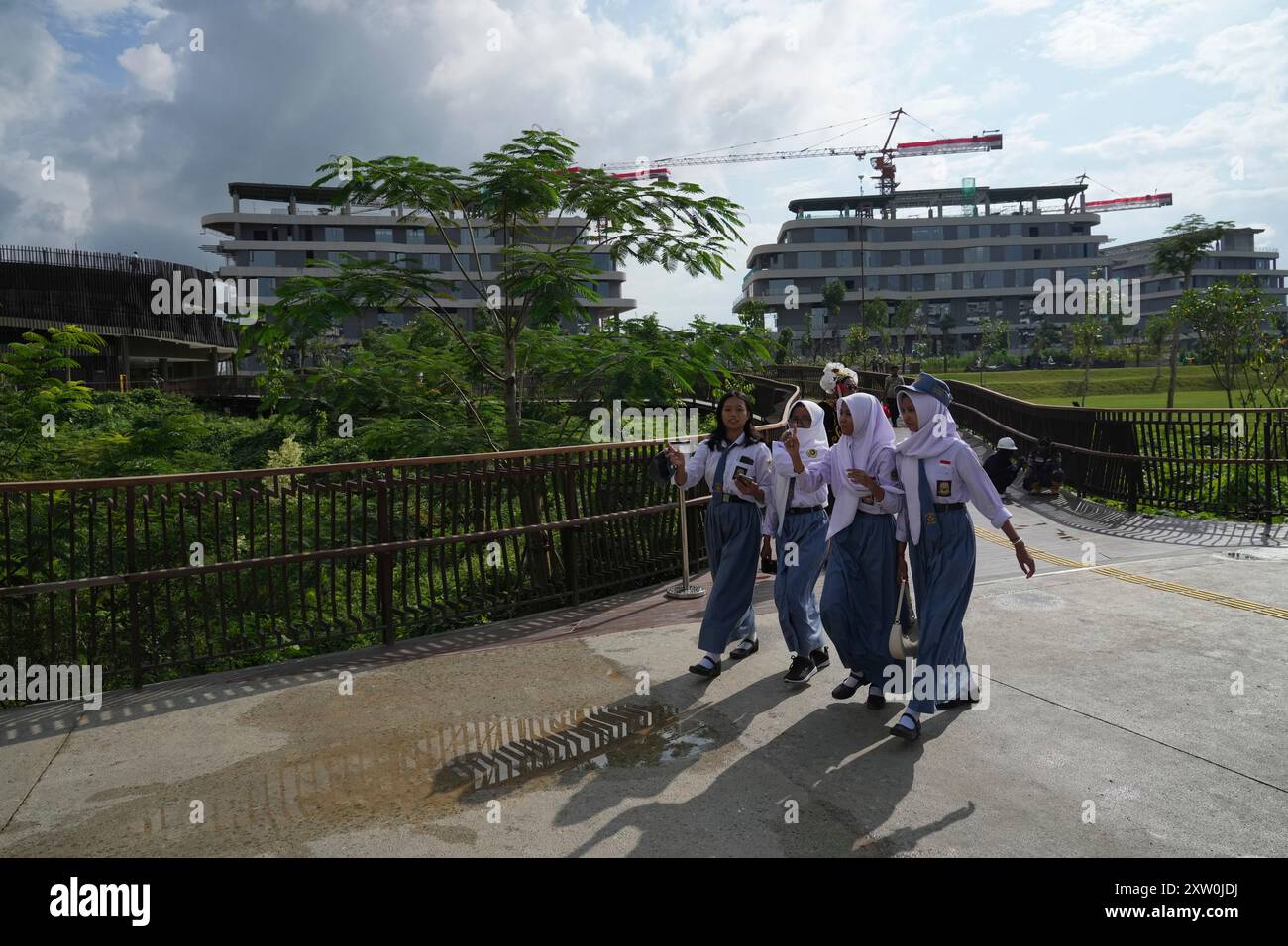 Indonesia student walks near construction site in the new capital city ...