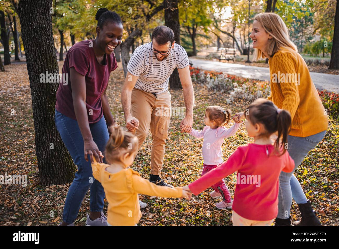 Circle of Fun: Family and Friends Enjoying Autumn Together Stock Photo ...