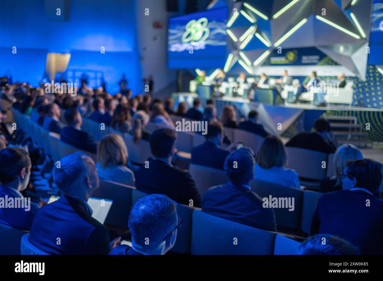 Large audience attending an international business conference with a ...