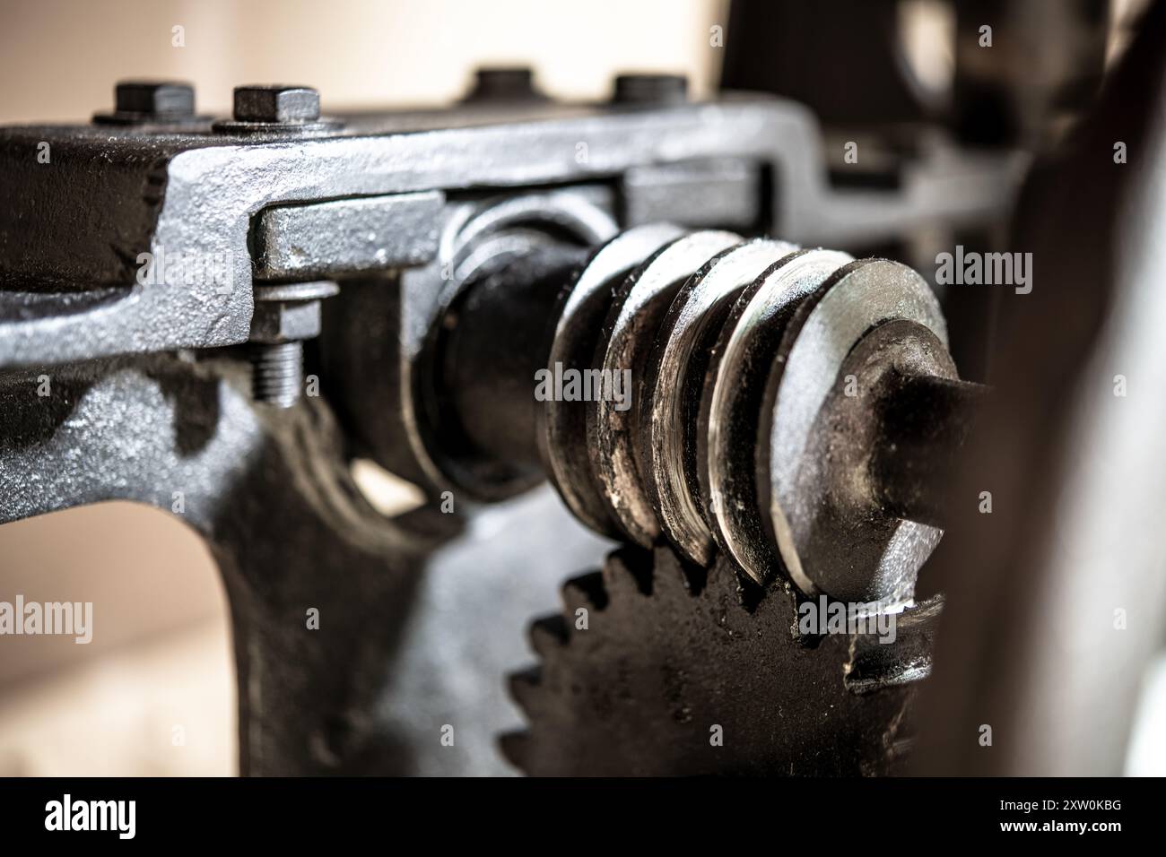 Intricate details of a vintage mechanical gear mechanism featuring ...