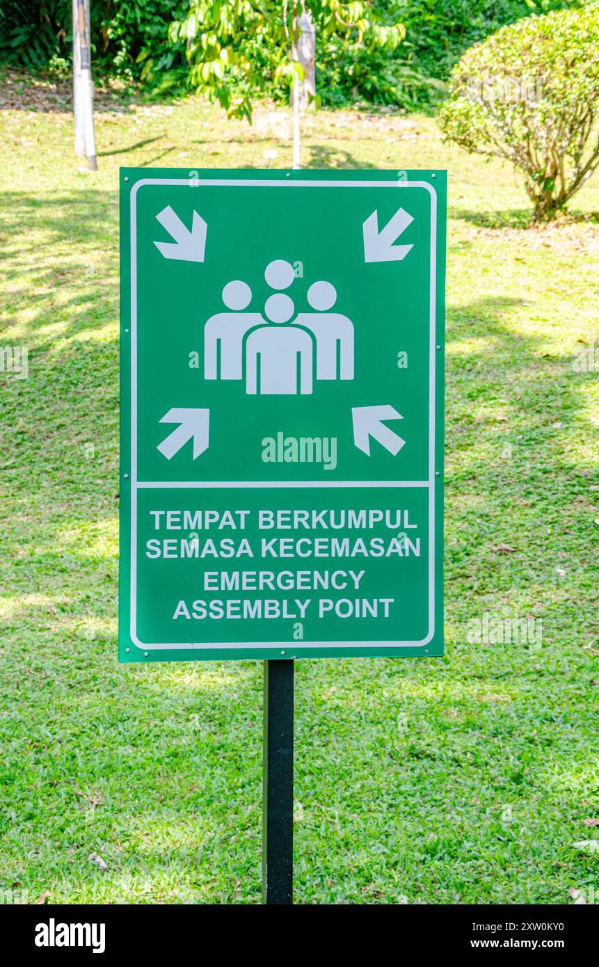 A sign denoting an Emergency Assembly Point in Penang Botanical Gardens ...