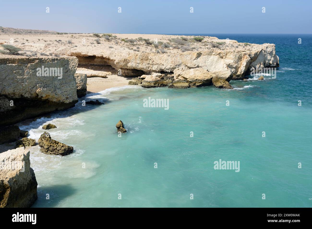 Cliff and sea along the coast near Tiwi village in the Sultanate of ...