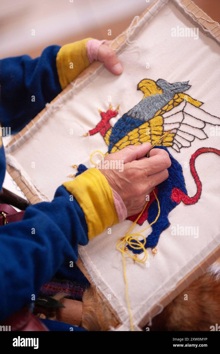 Old woman doing embroidery hi-res stock photography and images - Alamy