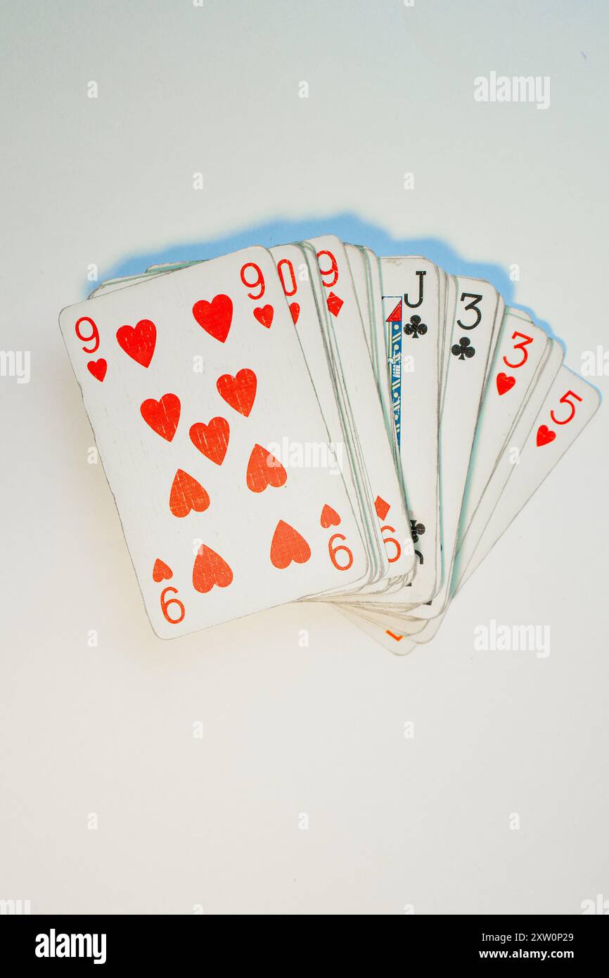 A deck of playing cards fanned out on a white background Stock Photo ...