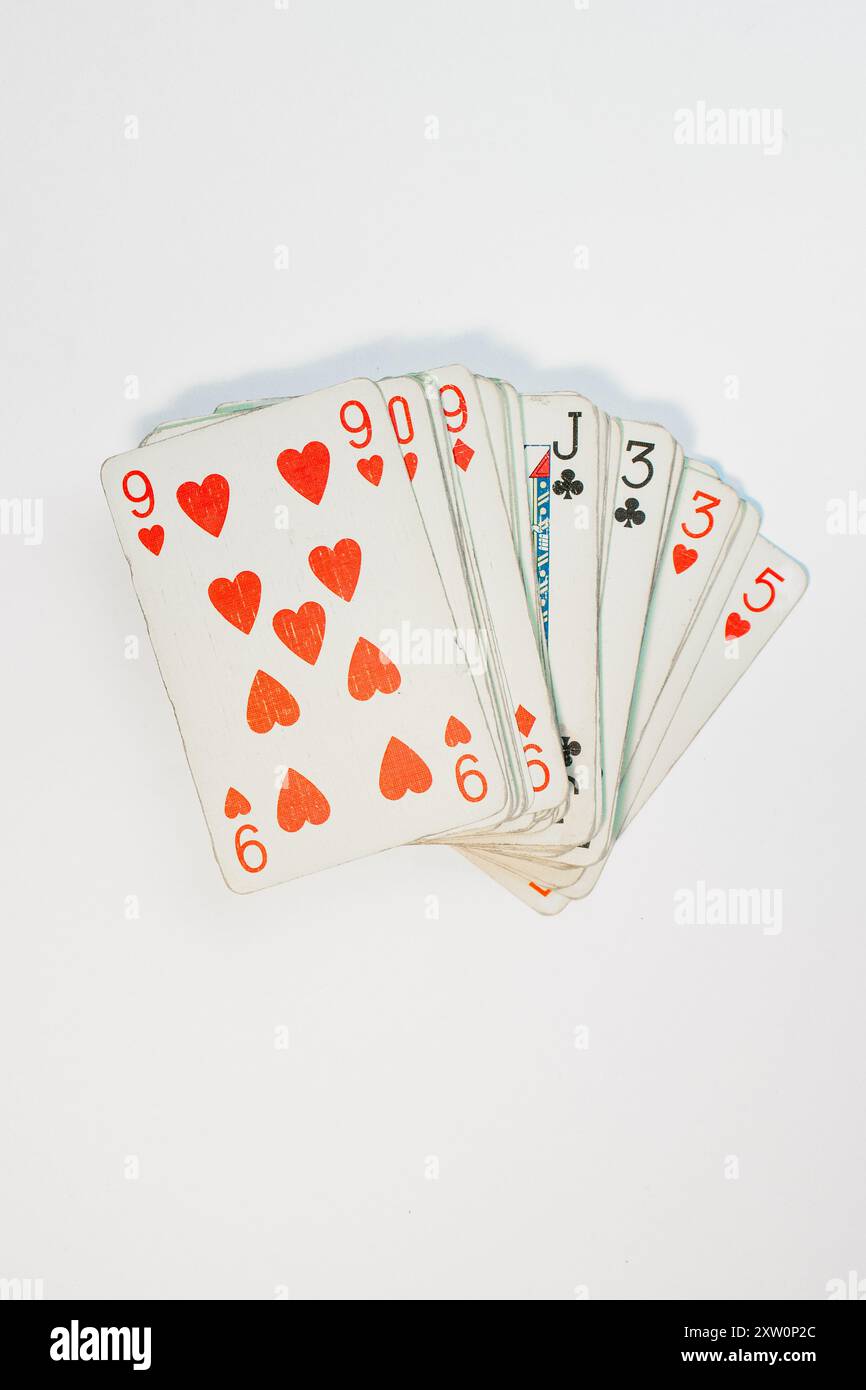 A deck of playing cards fanned out on a white background Stock Photo ...