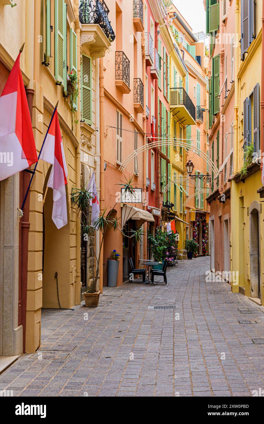 Colourful buildings line the old winding streets of Monaco Ville Stock ...