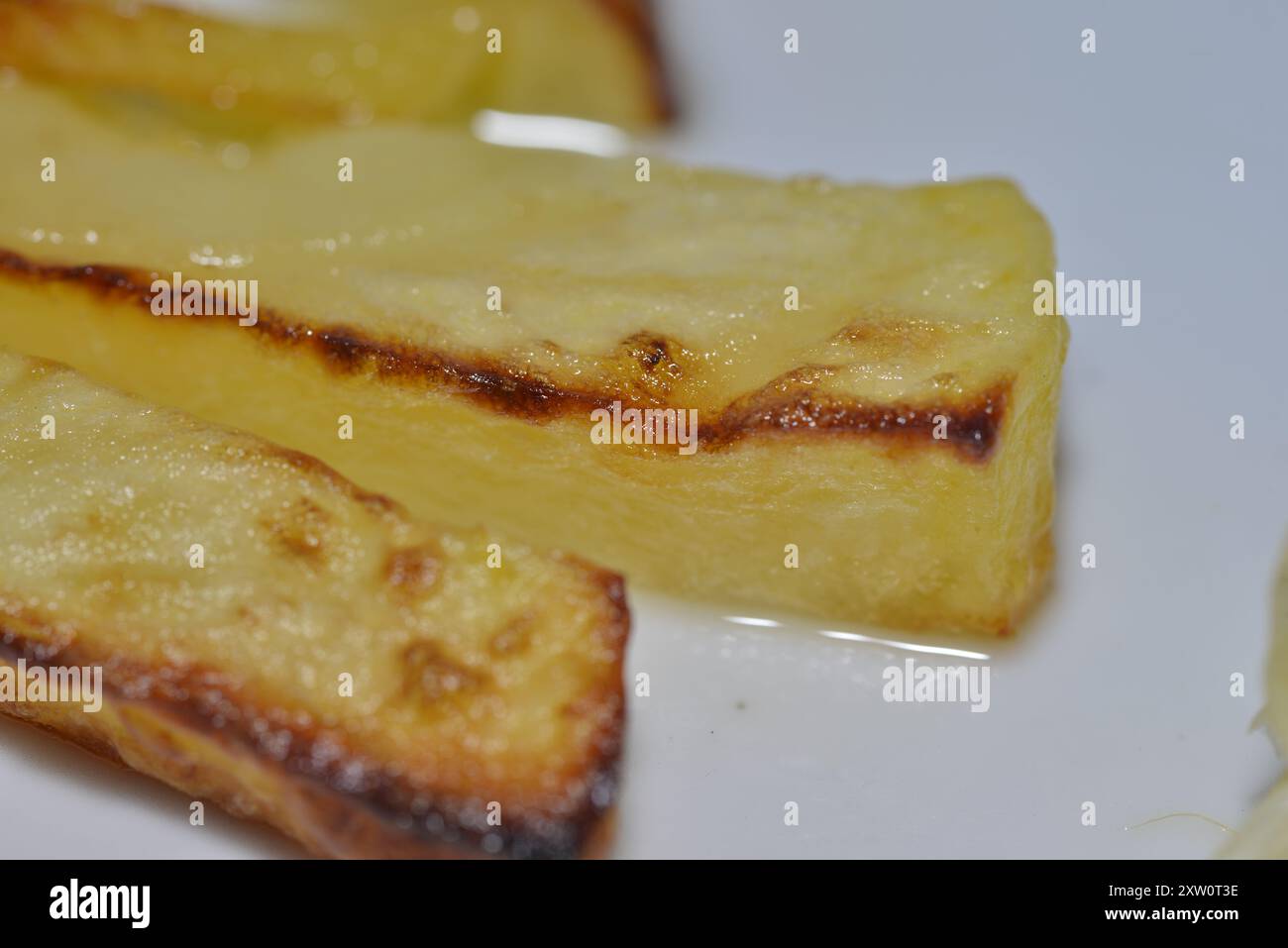 A photo of golden, crispy fried potatoes, capturing the deliciously ...