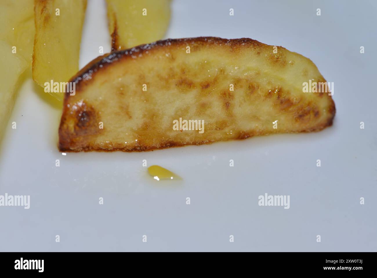 A photo of golden, crispy fried potatoes, capturing the deliciously ...