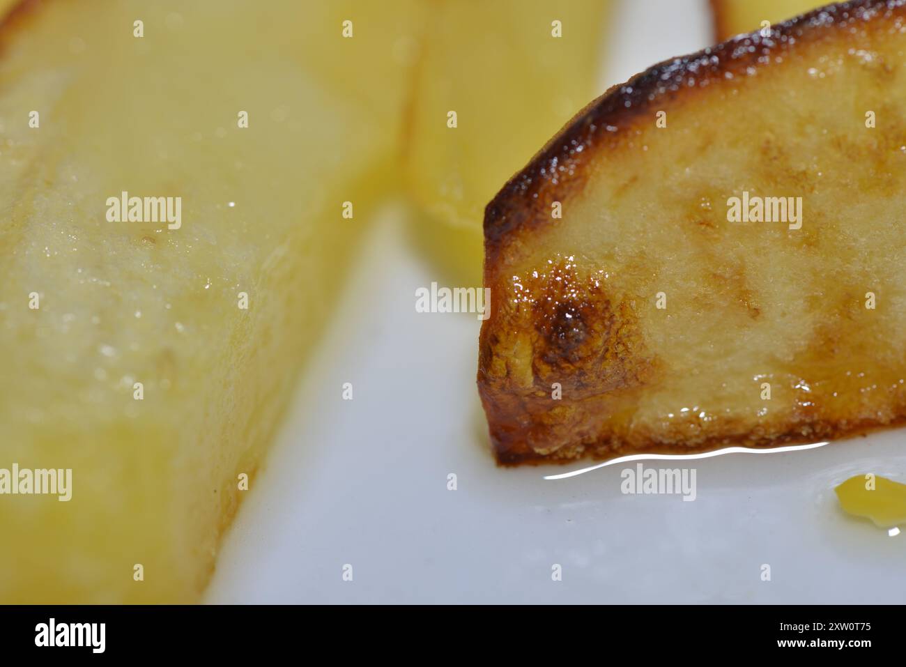 A photo of golden, crispy fried potatoes, capturing the deliciously ...