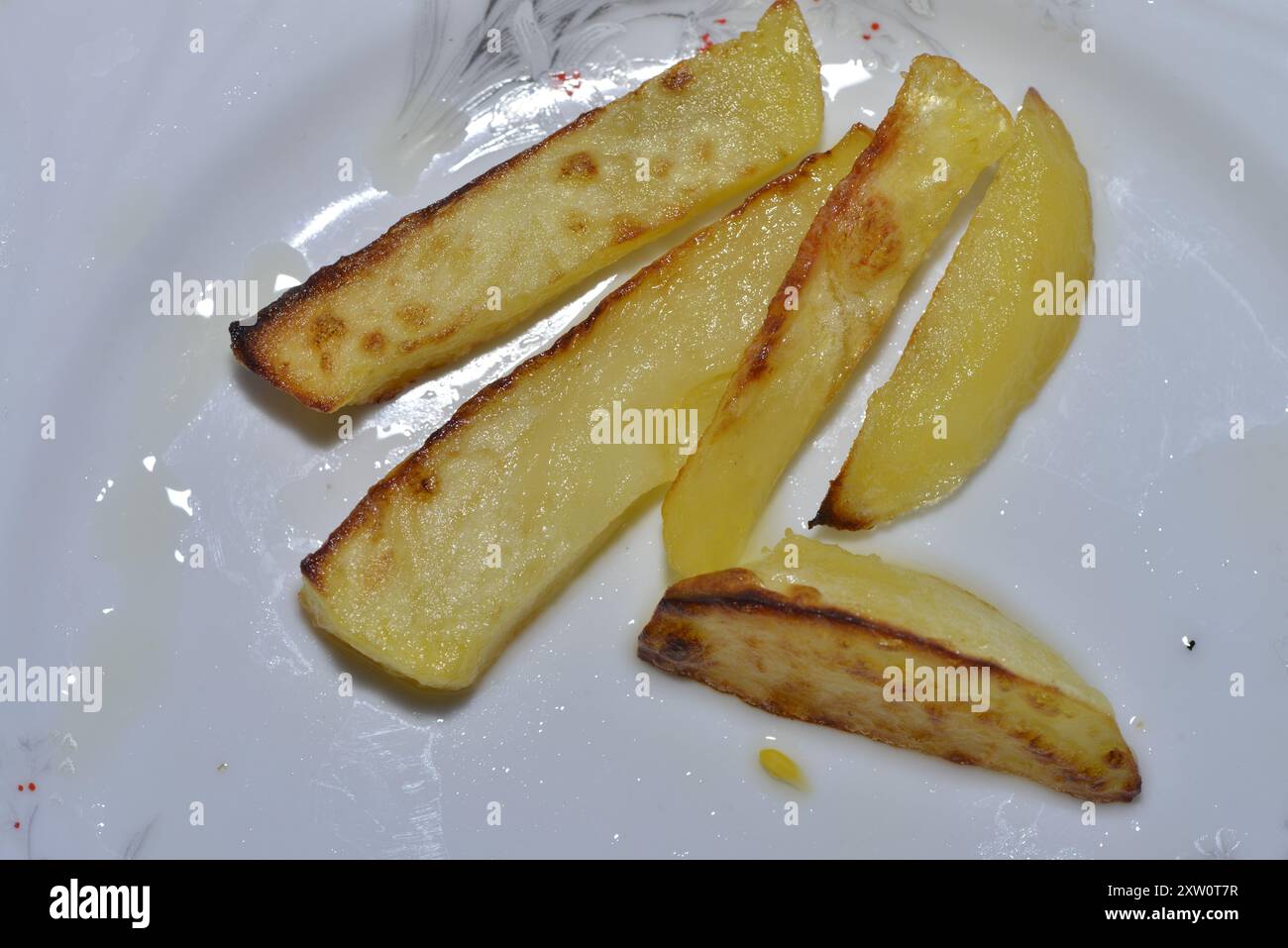 A photo of golden, crispy fried potatoes, capturing the deliciously ...