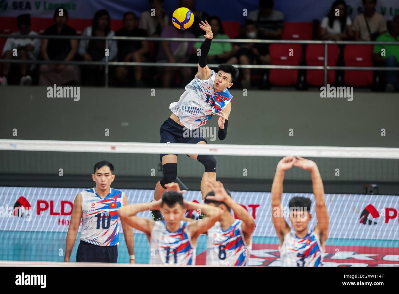 Manila, Philippines. 17th Aug, 2024. Ngoc Thuan Nguyen (rear) of Vietnam serves the ball during ...