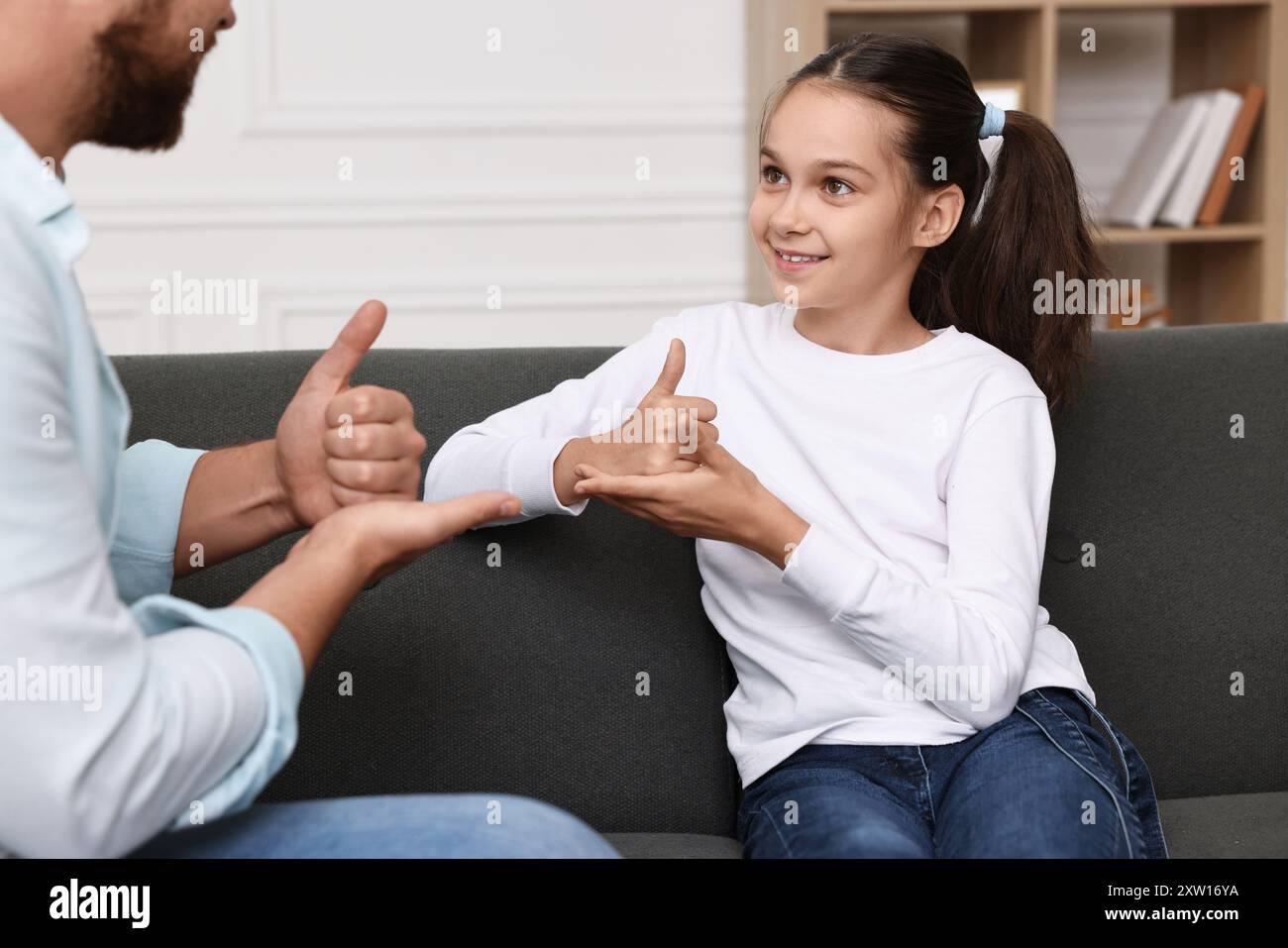 Child using sign language hi-res stock photography and images - Alamy
