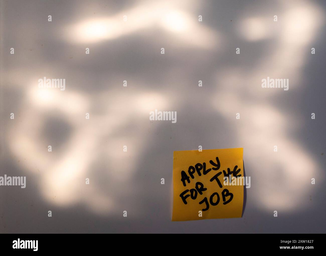Daily Reminder: Apply for the Job - A Yellow Sticky Note in Sunlight ...