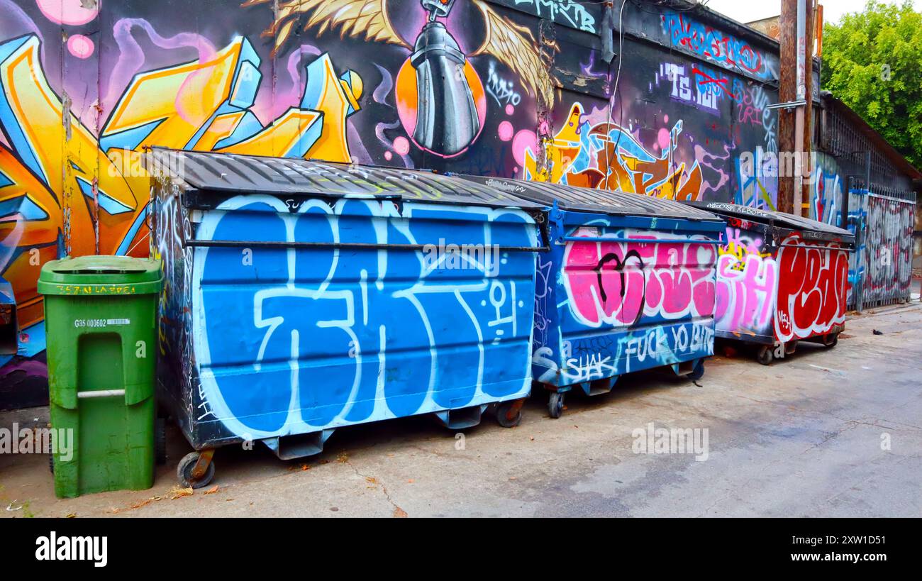 Garbage Containers with Graffiti Stock Photo - Alamy