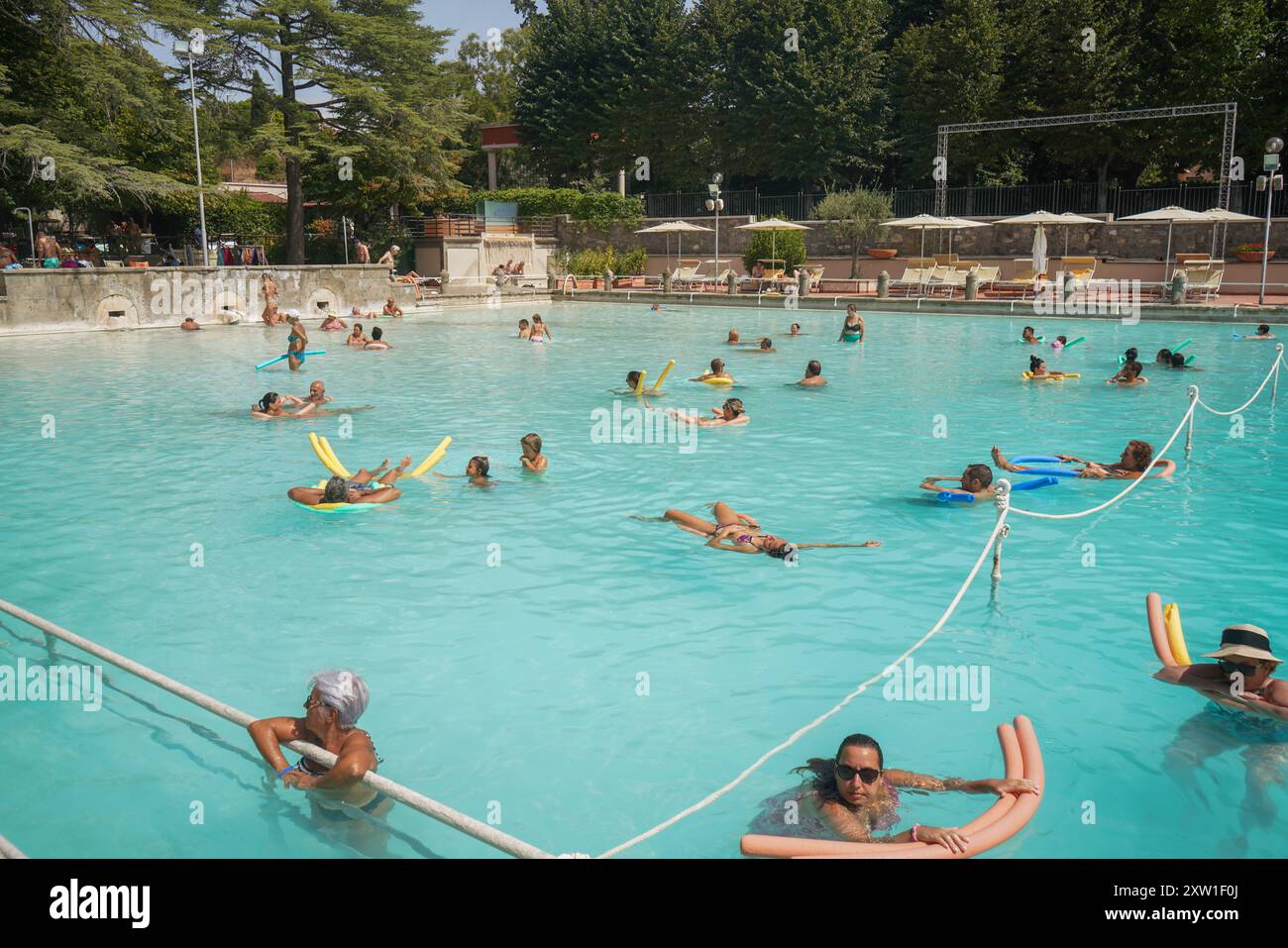Viterbo, Italy. 17 August 2024. People bathing in the Thermal baths in ...