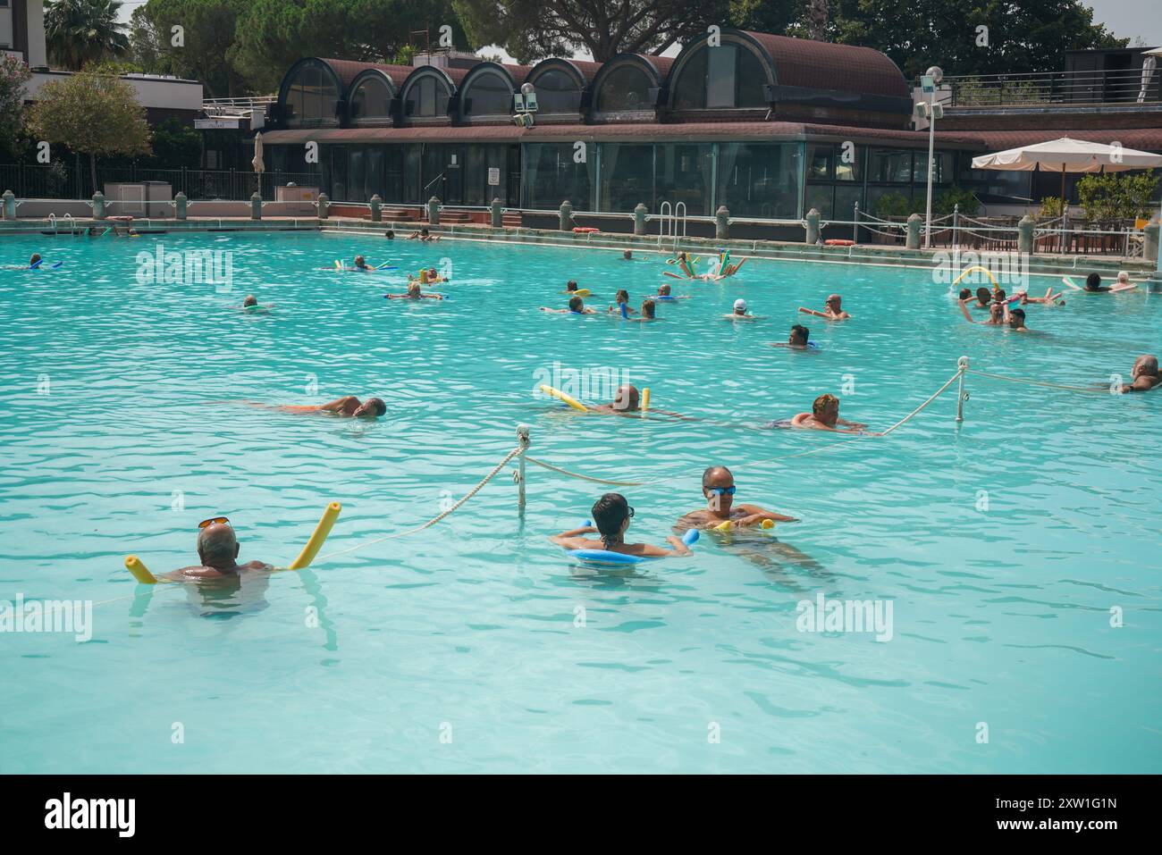 Viterbo, Italy. 17 August 2024. People bathing in the Thermal baths in ...