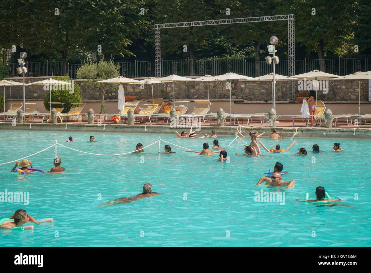 Viterbo, Italy. 17 August 2024. People bathing in the Thermal baths in ...