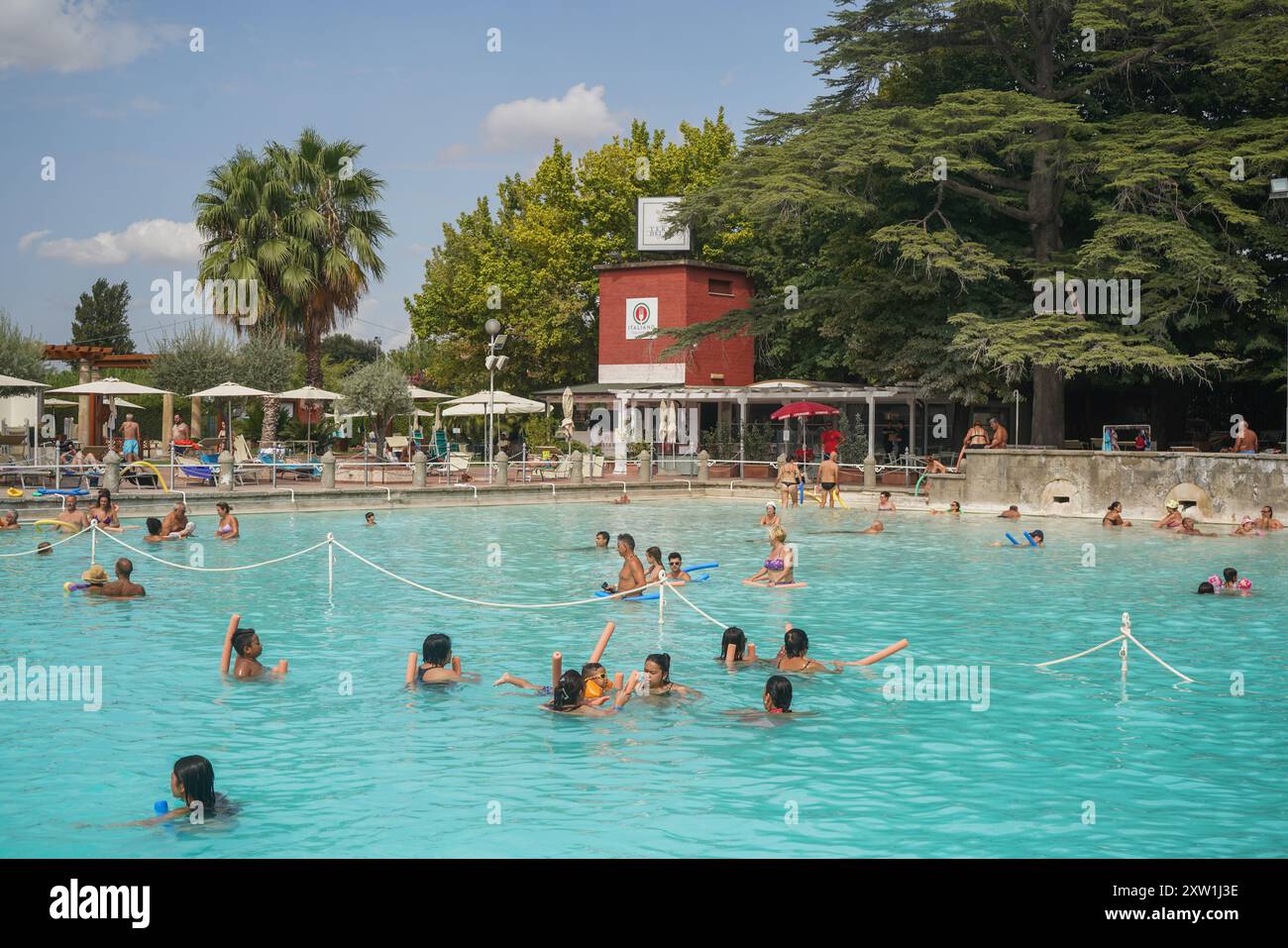 Viterbo, Italy. 17 August 2024. People bathing in the Thermal baths in ...
