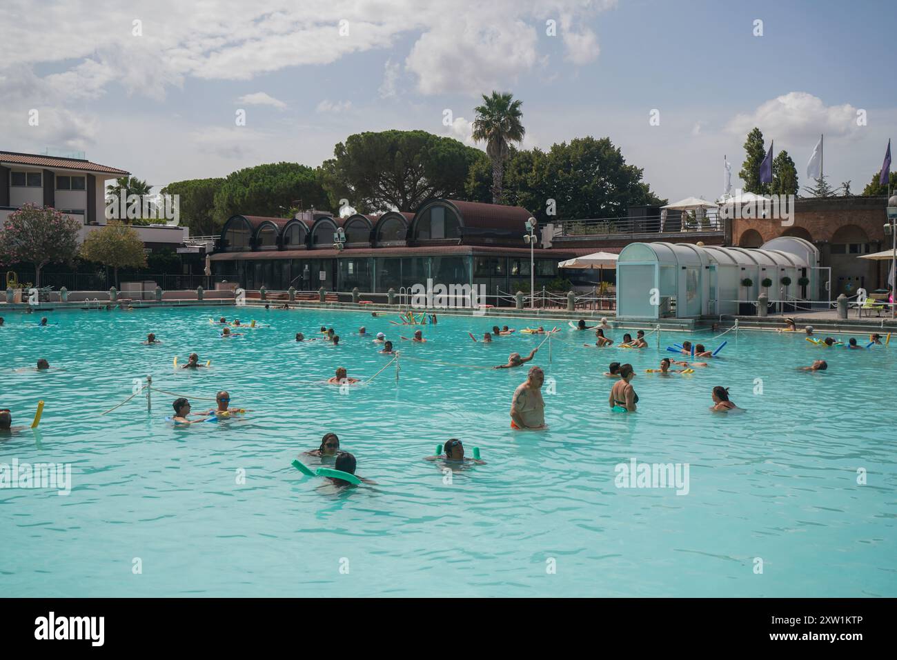 Viterbo, Italy. 17 August 2024. People bathing in the Thermal baths in ...