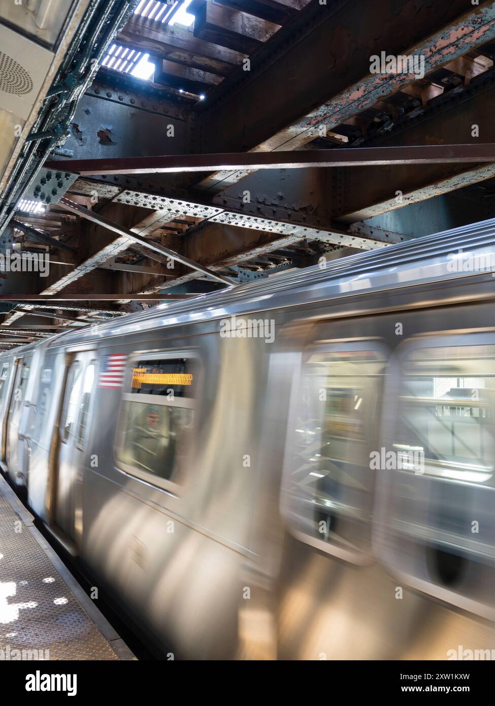 A subway train is approaching a station in New York City Stock Photo ...