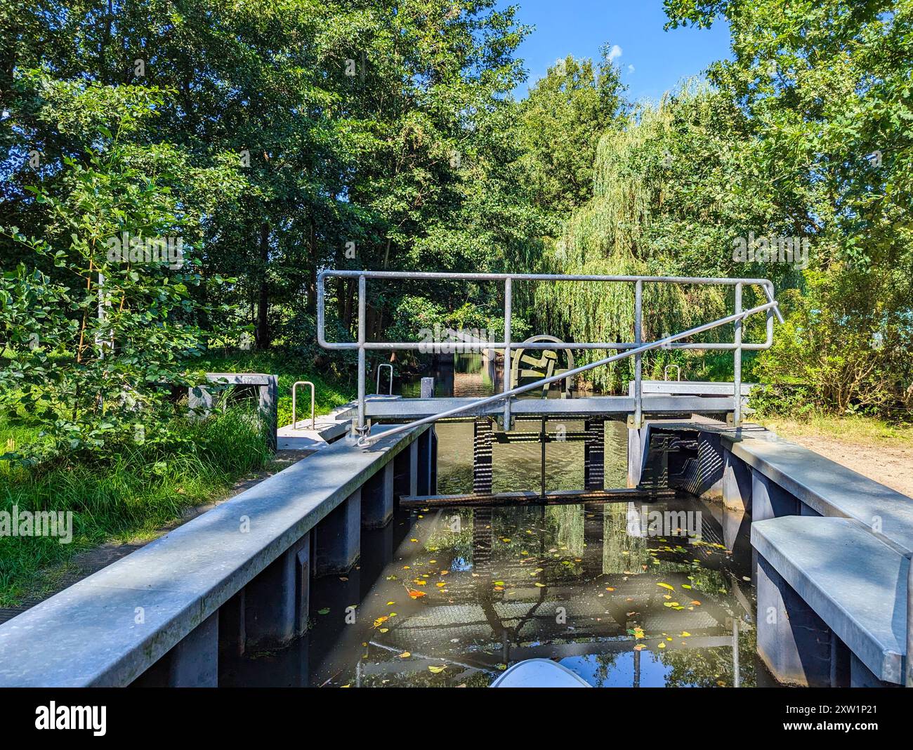Germany, Brandenburg, Schlepzig, August 16, 2024: Hydraulic lock gate ...