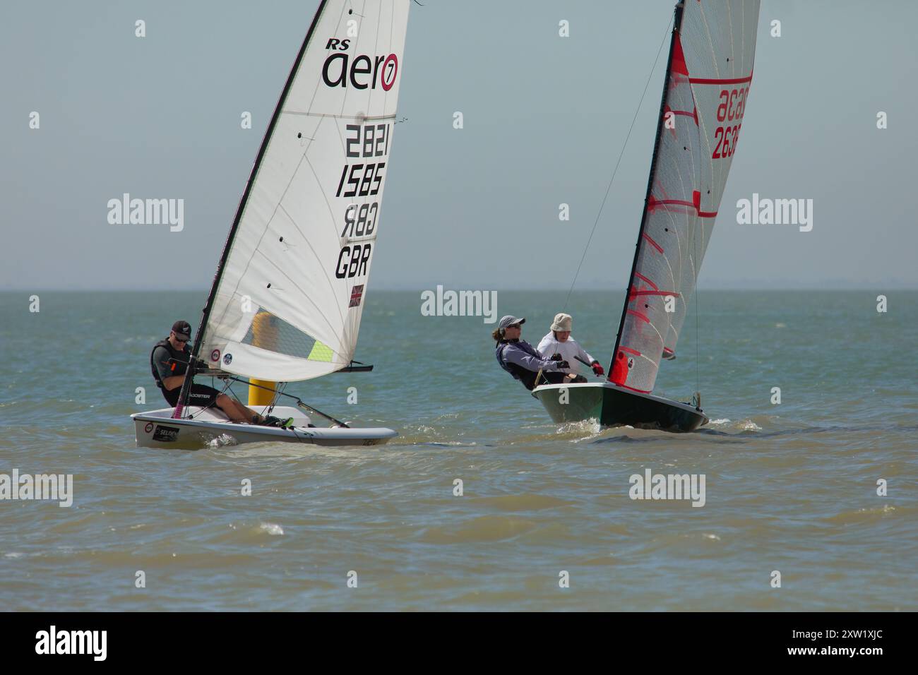 Local sailing enthusiatsts enjoying dinghy racing at Hythe,Kent,UK ...