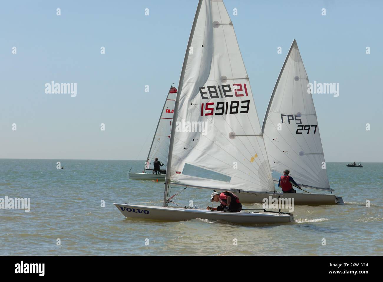 Local sailing enthusiatsts enjoying dinghy racing at Hythe,Kent,UK ...