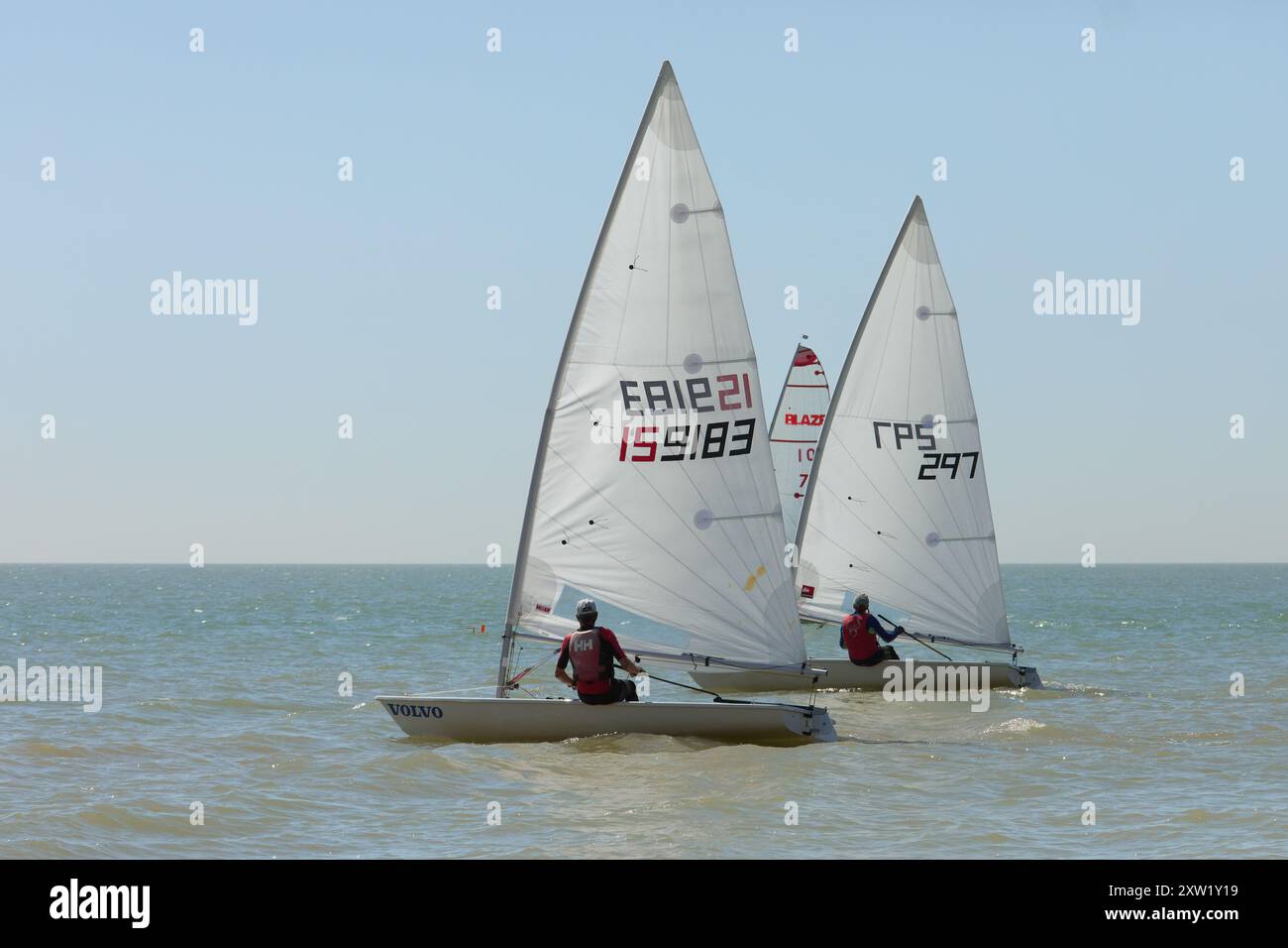 Local sailing enthusiatsts enjoying dinghy racing at Hythe,Kent,UK ...