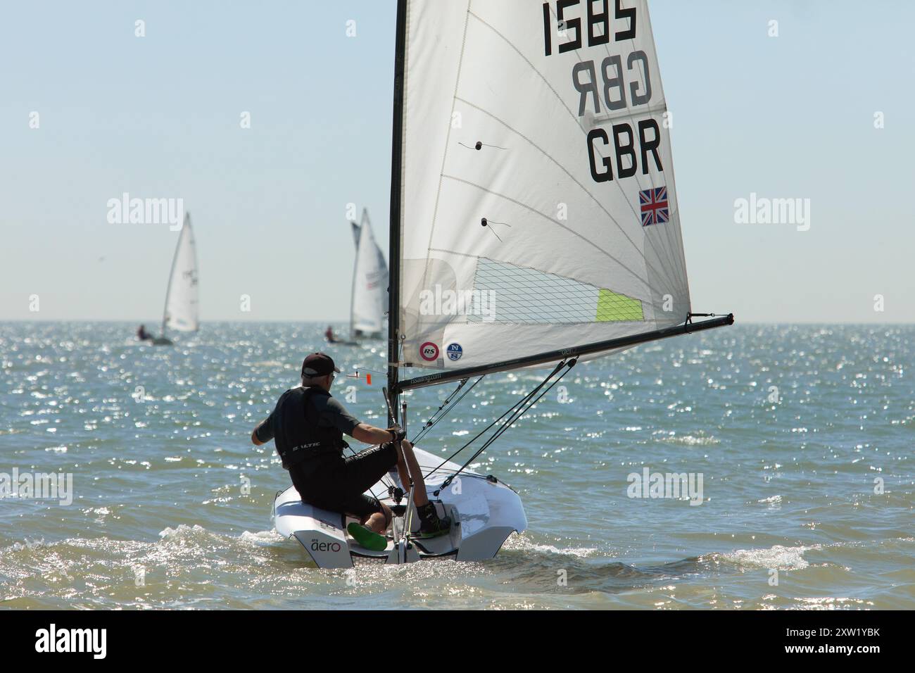 Local sailing enthusiatst enjoying dinghy racing at Hythe,Kent,UK Stock ...