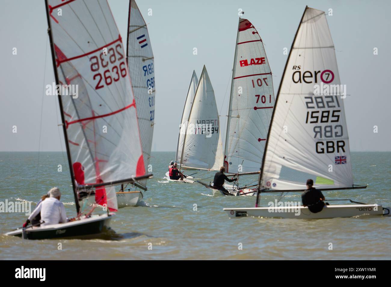 Local sailing enthusiatsts enjoying dinghy racing at Hythe,Kent,UK ...