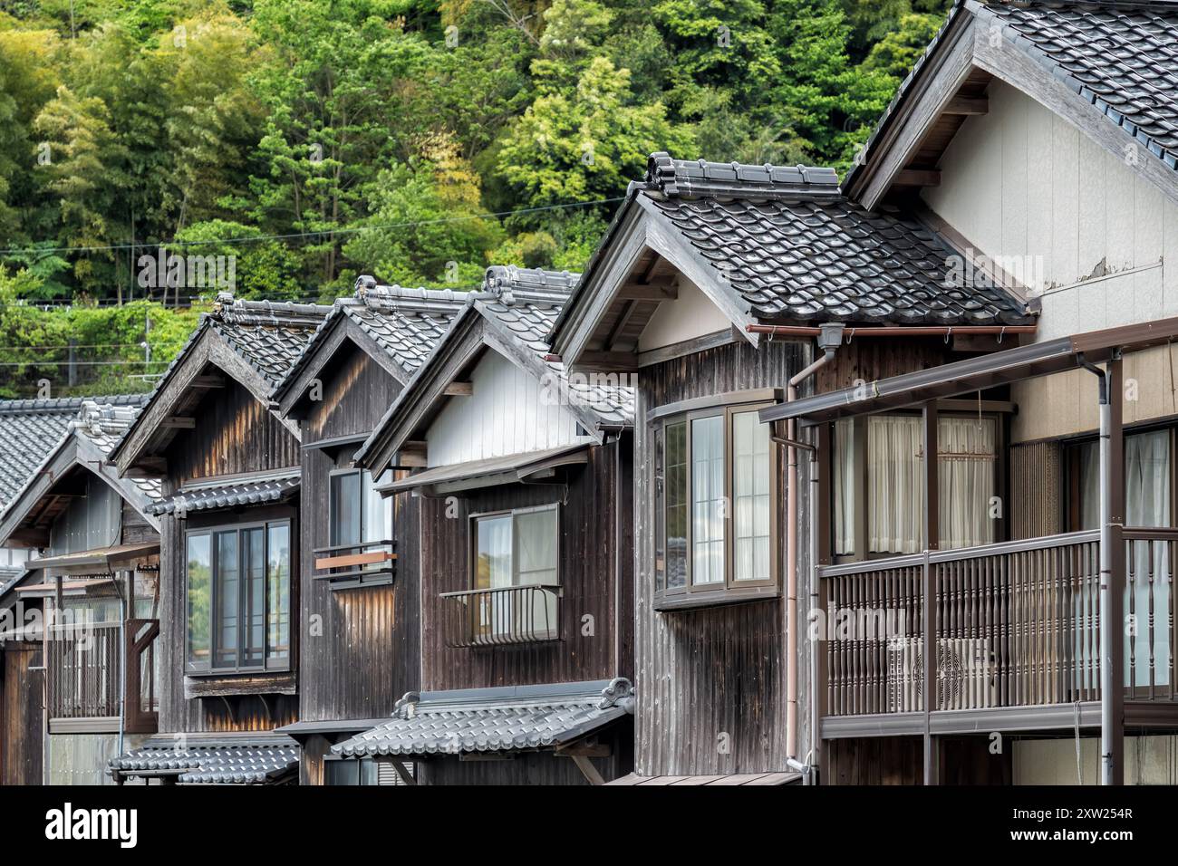 Close up detail with the wooden traditional waterfront boat houses ...