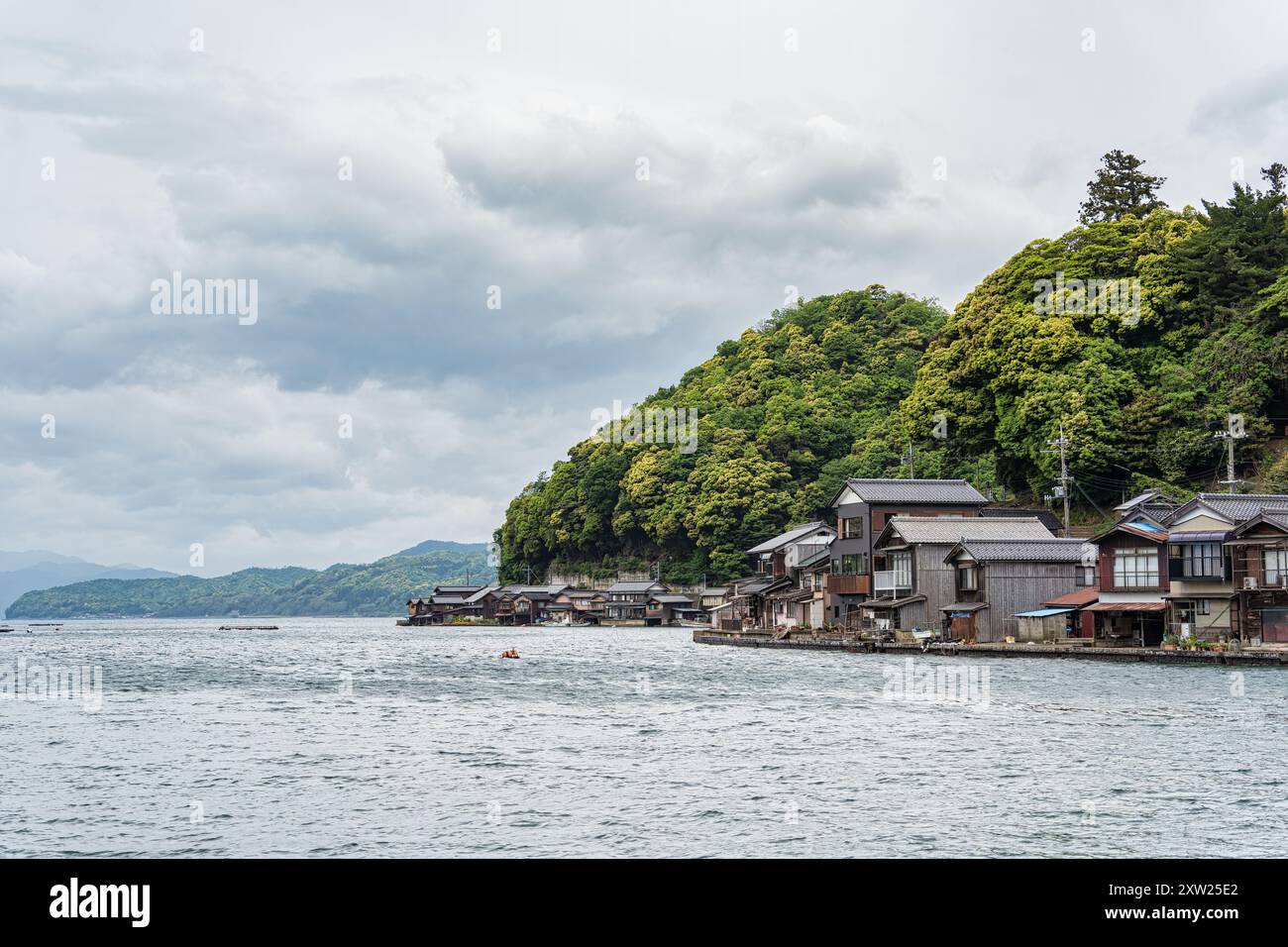 Beautiful scenic view with the wooden traditional waterfront boat ...