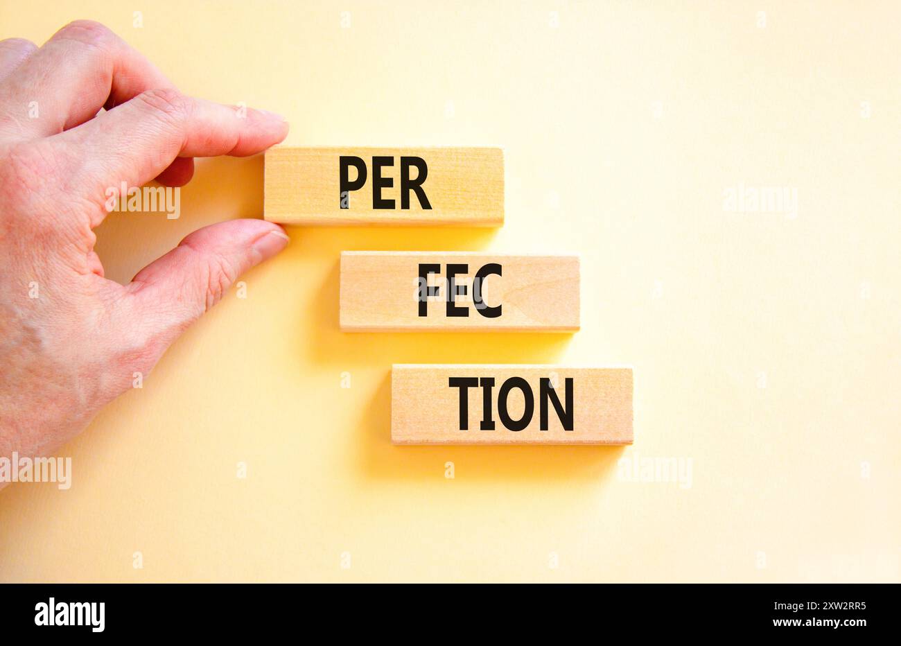 Perfection symbol. Concept word Perfection on beautiful wooden blocks ...