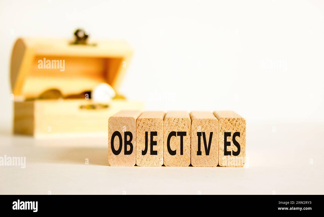 Objectives symbol. Concept word Objectives on beautiful wooden blocks ...