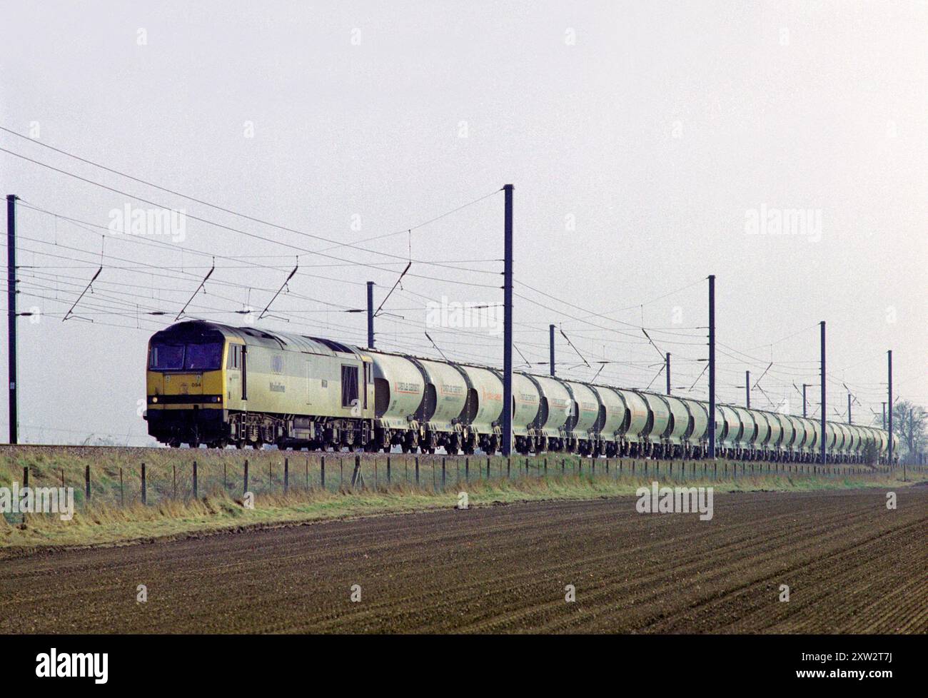 A Class 60 diesel locomotive number 60094 working a train of empty ...