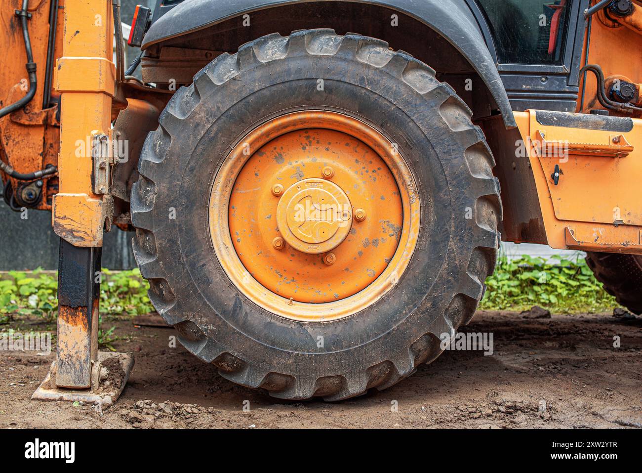 Construction tractor wheel Stock Photo - Alamy