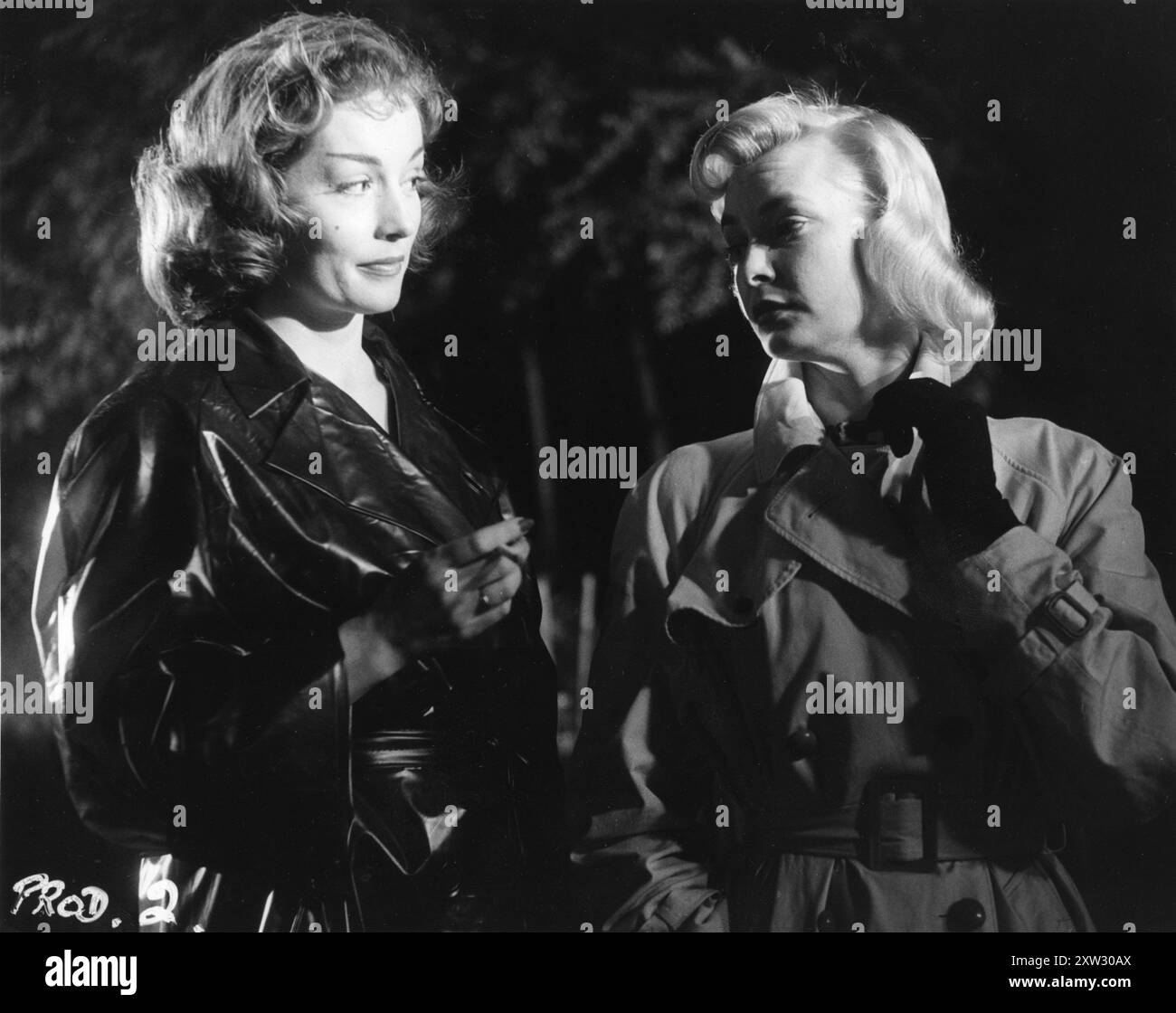 BARBARA SHELLEY and KAY CALLARD in a scene from CAT GIRL 1957 Director ...