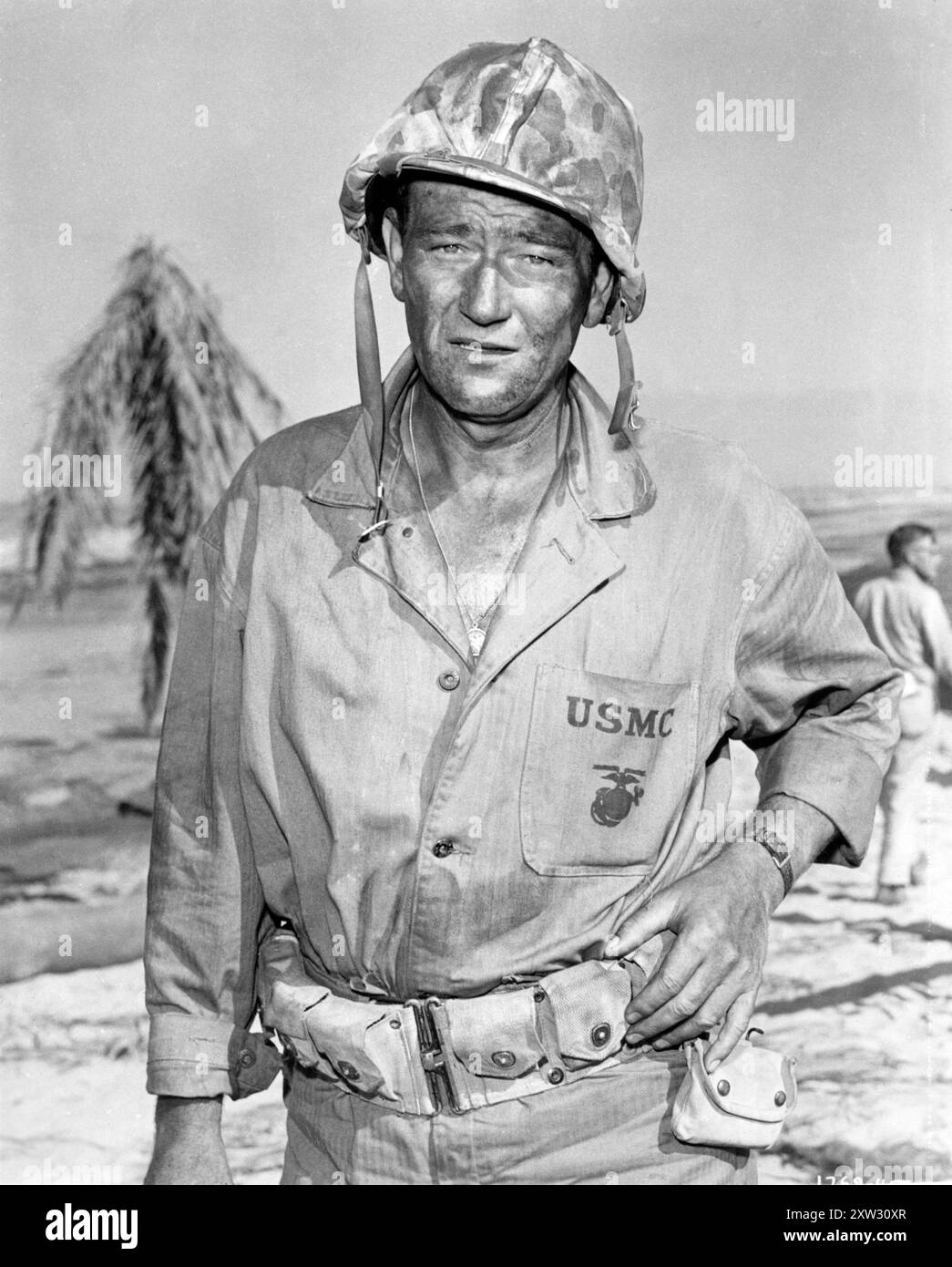 A portrait of JOHN WAYNE as Sergeant Stryker in SANDS OF IWO JIMA 1949 ...
