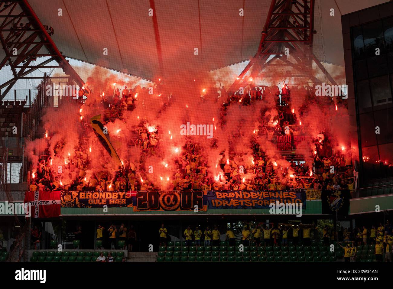 WARSAW, POLAND - AUGUST 15: Ultras fans of Brondby IF set up flares ...