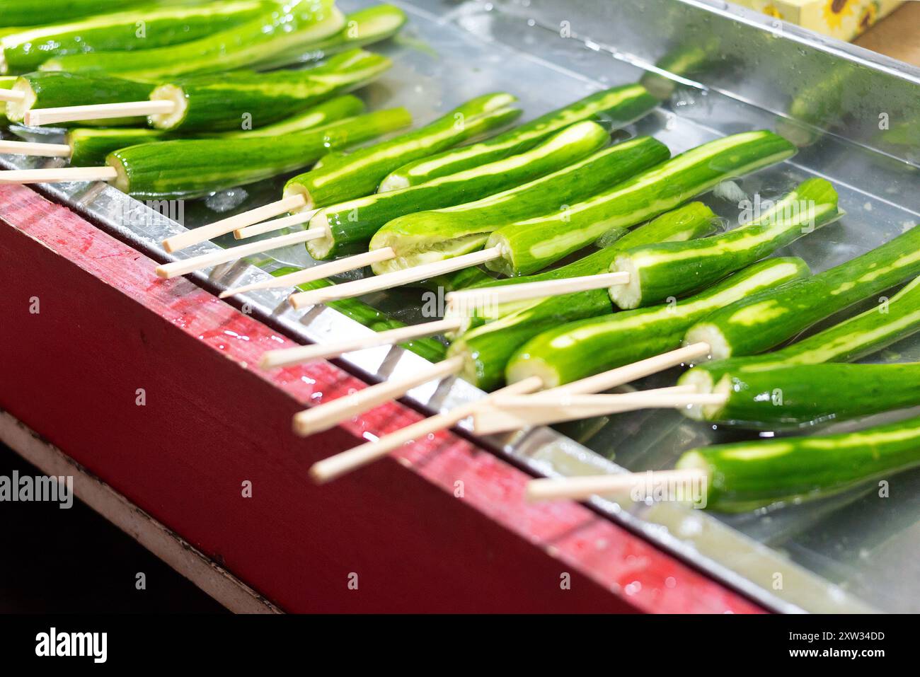 Chilled cucumbers on sticks are popular during summer events and ...