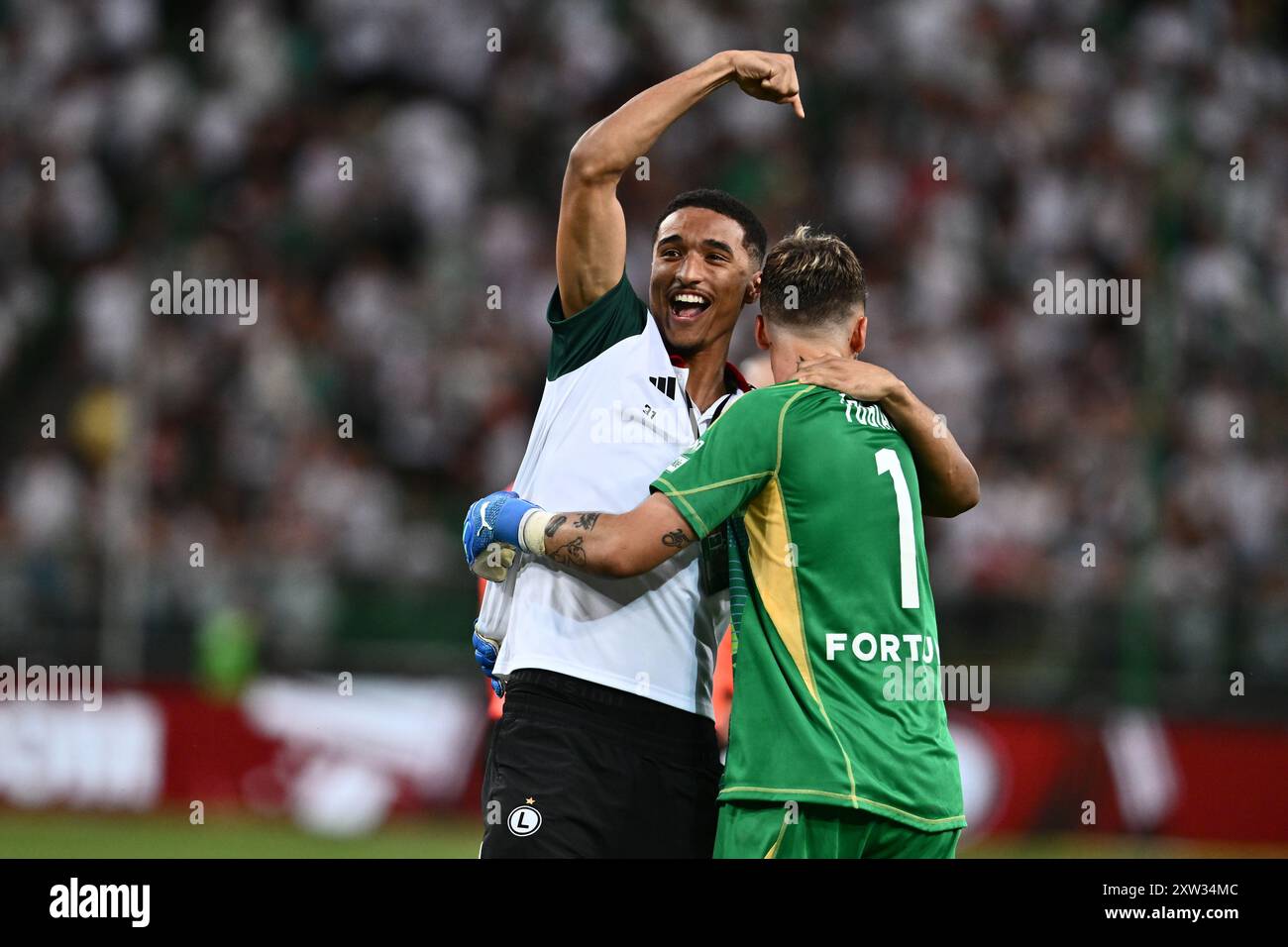 WARSAW, POLAND - AUGUST 15: goalkeepers Marcel Mendes-Dudzinski, Kacper ...
