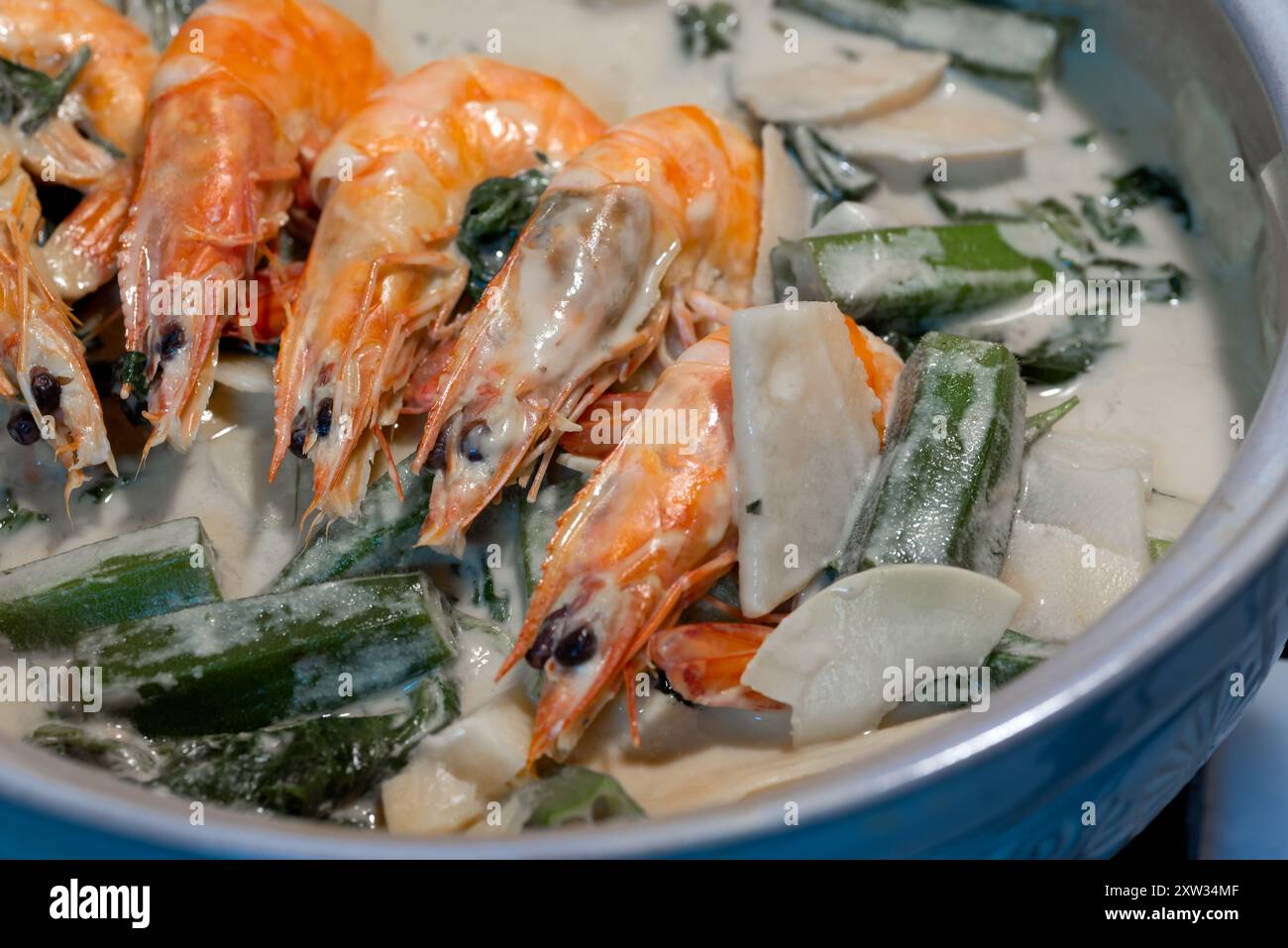 Ginataang labong na may hipon - a Filipino dish of boiled shrimp and ... Ginataang labong na may hipon - a Filipino dish of boiled shrimp and ...