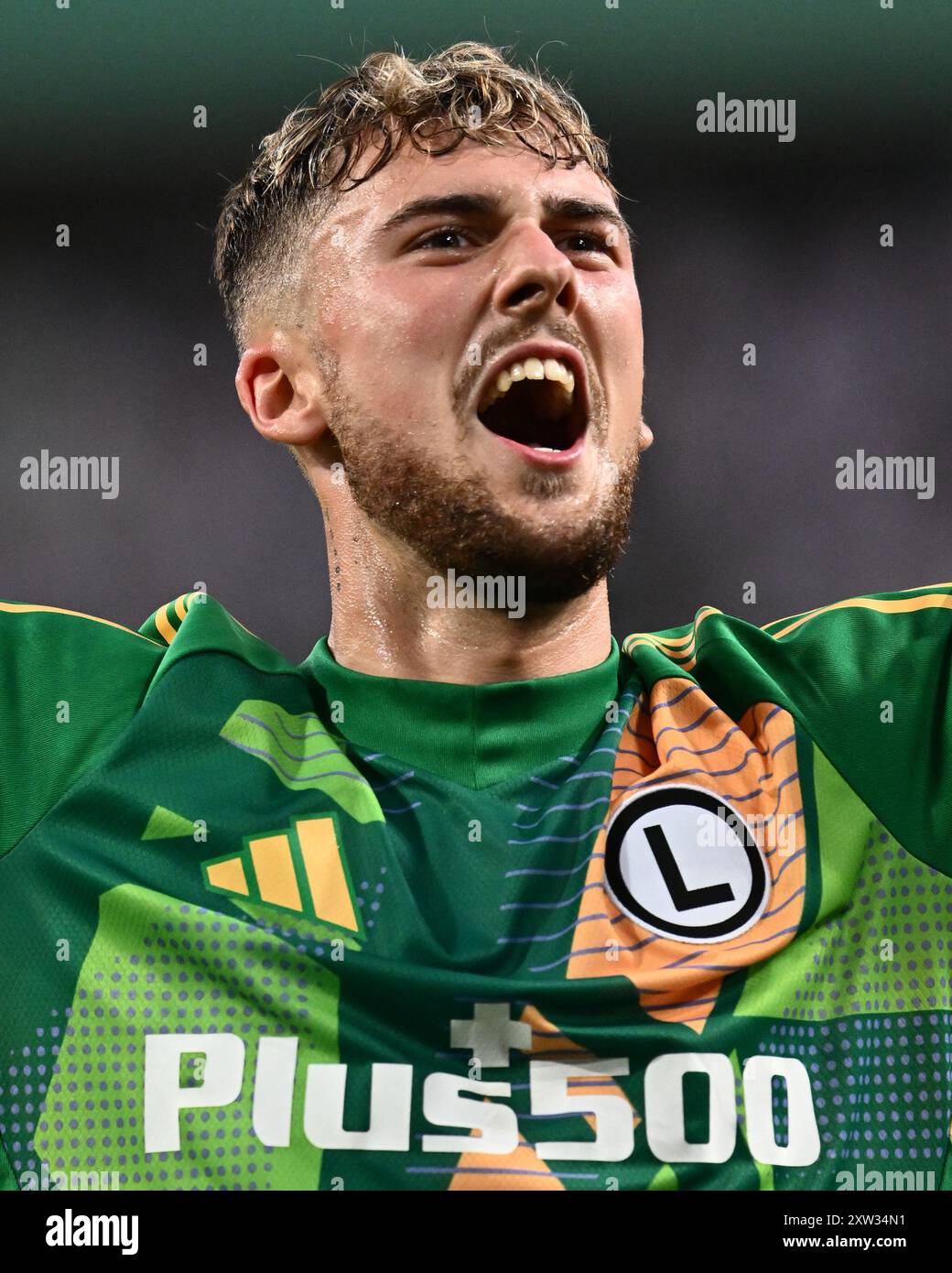 WARSAW, POLAND - AUGUST 15: goalkeeper Kacper Tobiasz of Legia Warszawa ... WARSAW, POLAND - AUGUST 15: goalkeeper Kacper Tobiasz of Legia Warszawa ...
