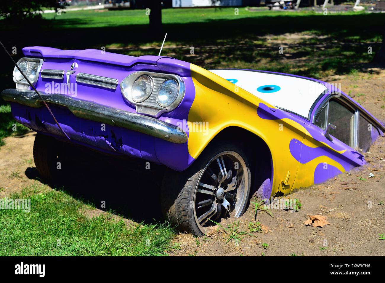 Dover, Illinois, USA. Automotive art appearing on a lawn in a tiny ...