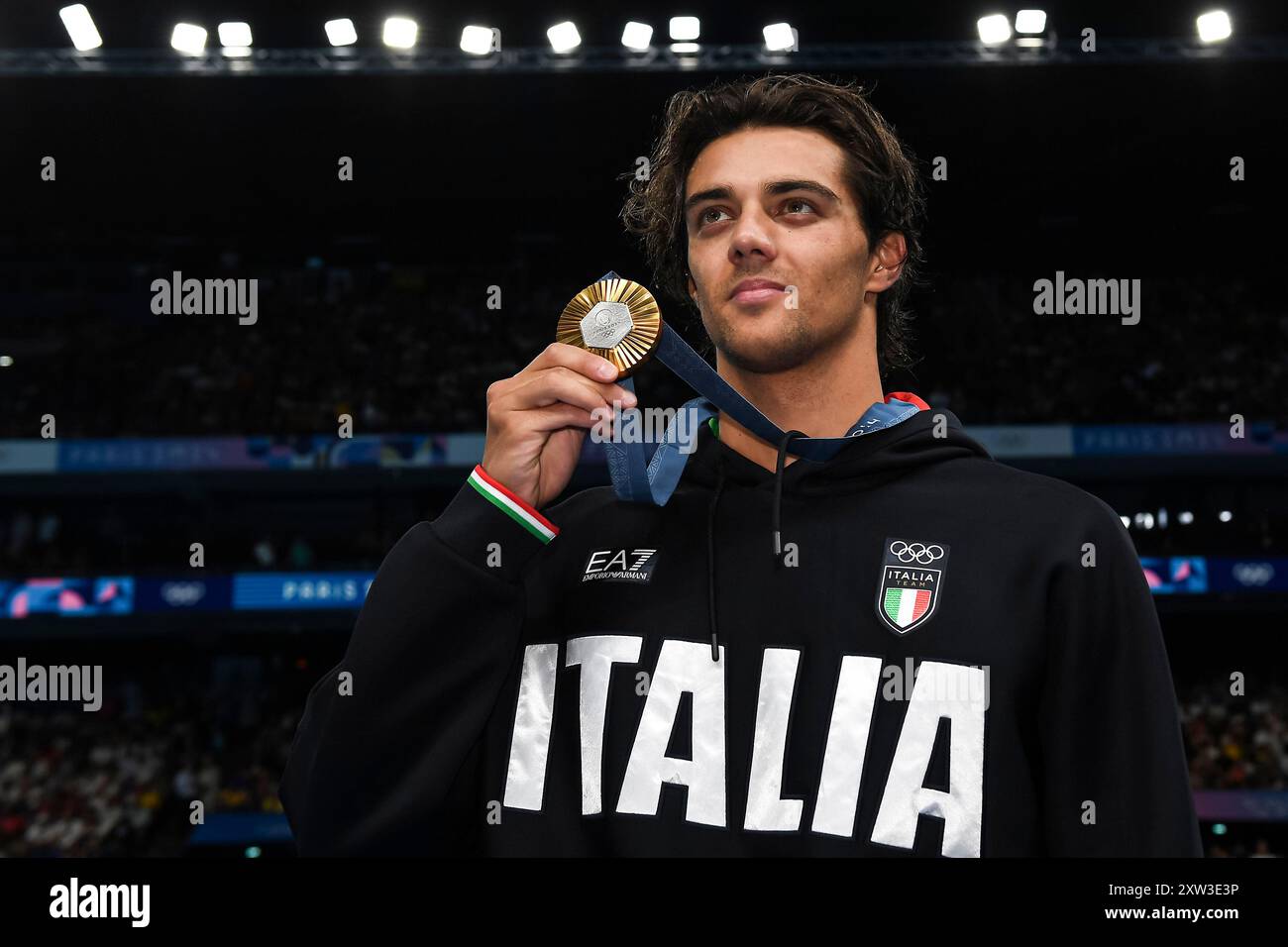 Thomas Ceccon of Italy celebrates after winning the gold medal in the ...