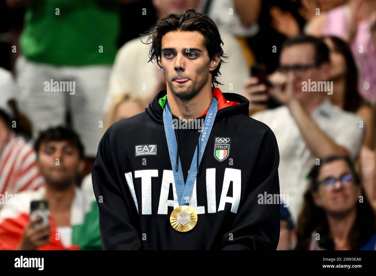 Thomas Ceccon of Italy reacts after winning the gold medal in the ...