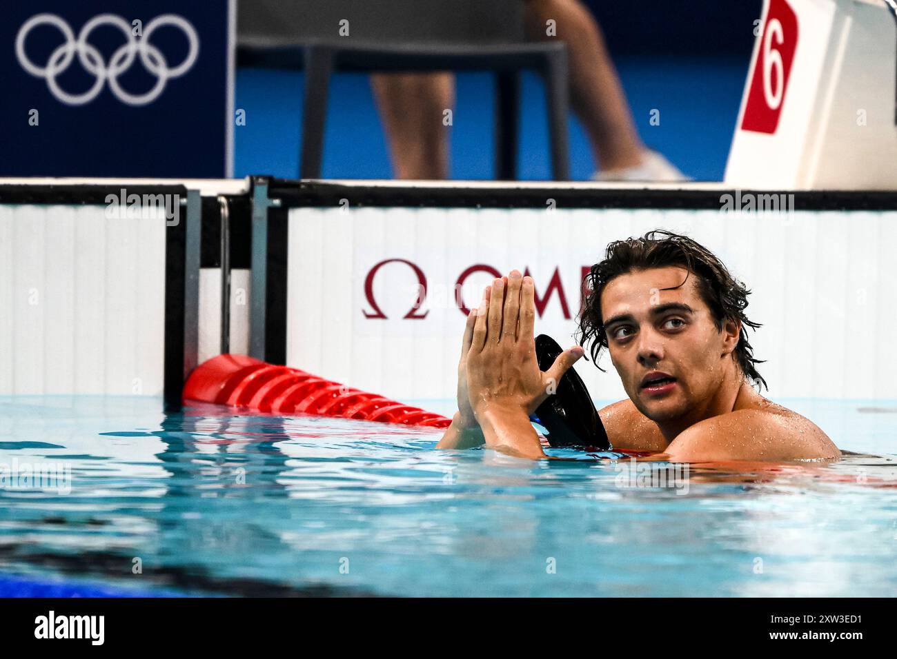 Thomas Ceccon of Italy reacts after winning the gold medal in the ...
